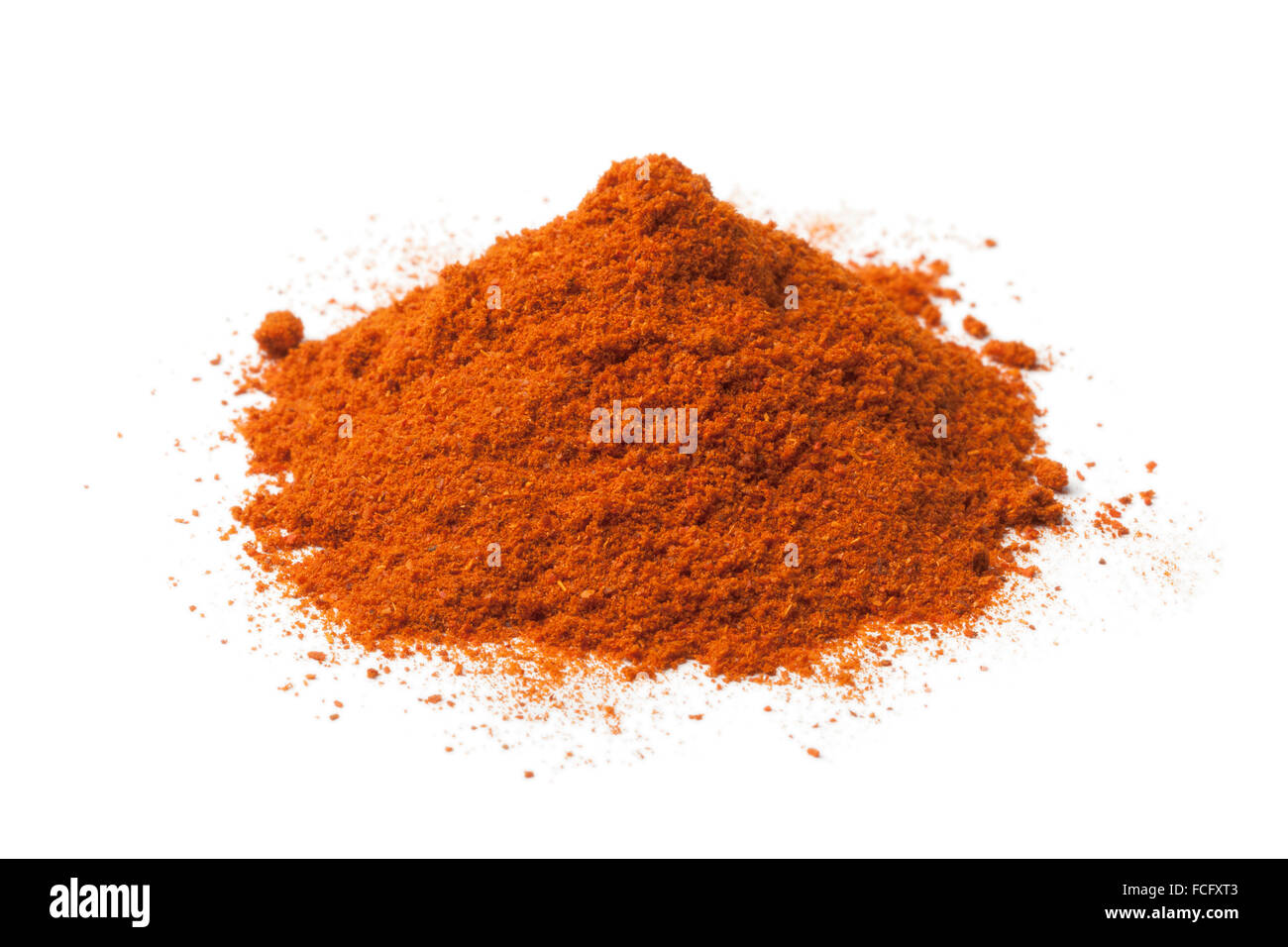 Heap of ground chili powder on white background Stock Photo - Alamy