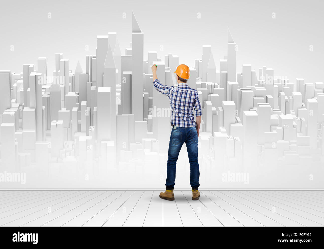 Rear view of engineer drawing project of business district Stock Photo ...