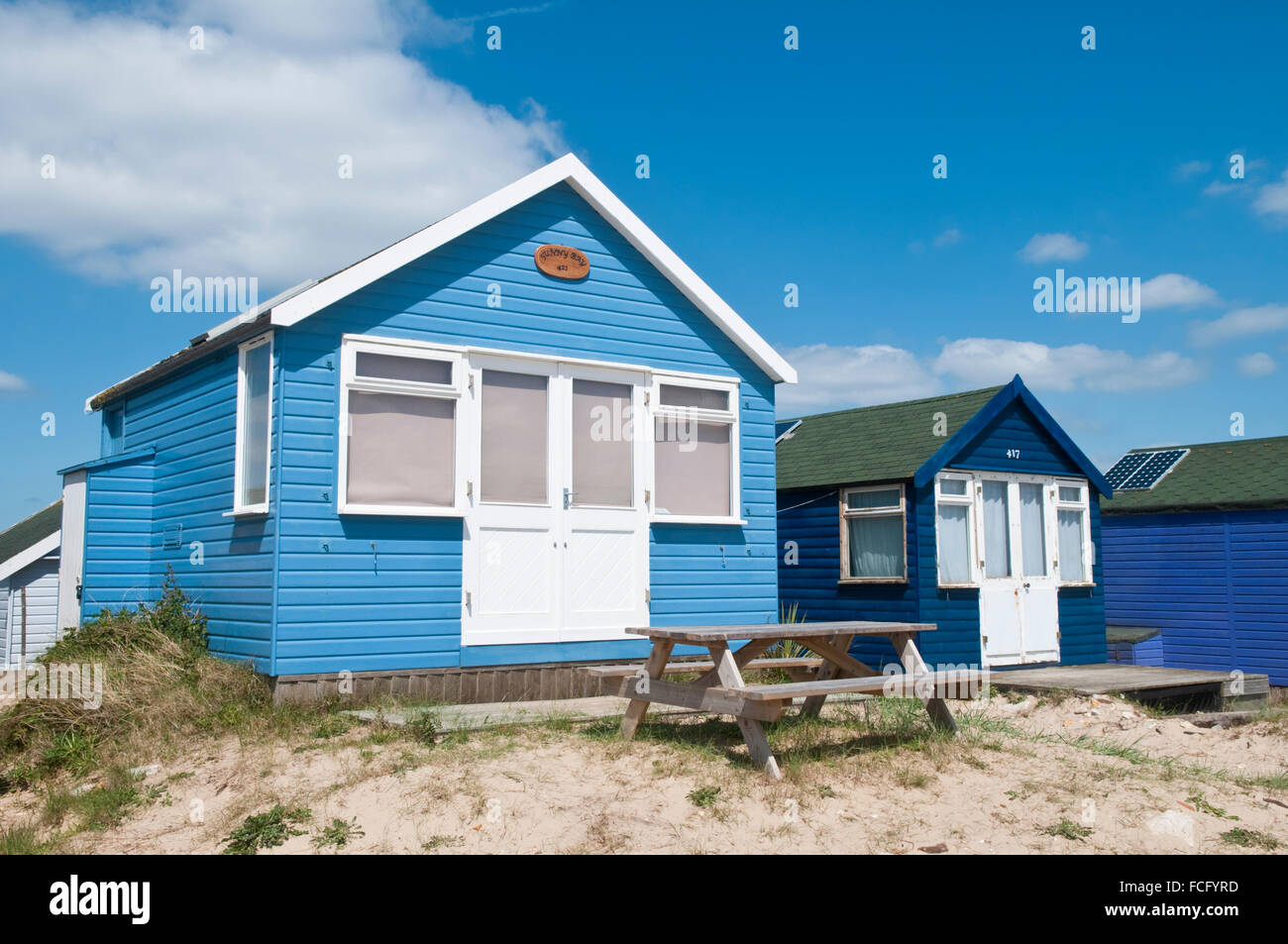 Blue beach huts at Mudeford Sandbank, Hengistbury Head, near ...