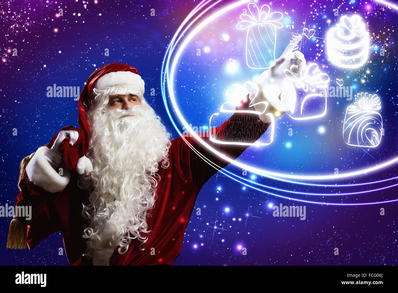 Santa Clause with gift bag behind shoulders Stock Photo - Alamy