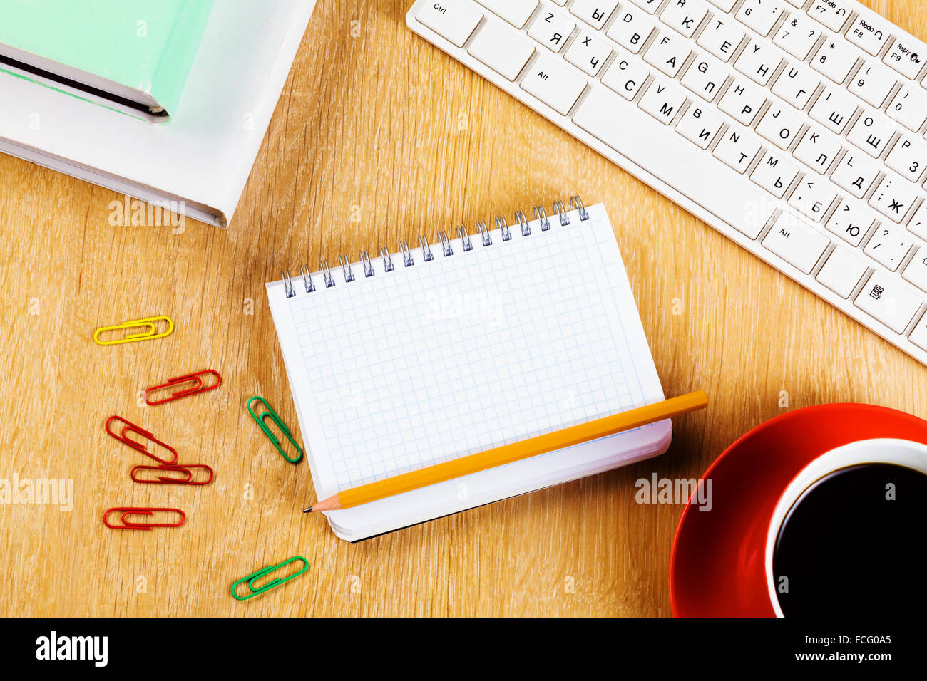 Office table notepad computer tea hi-res stock photography and images ...