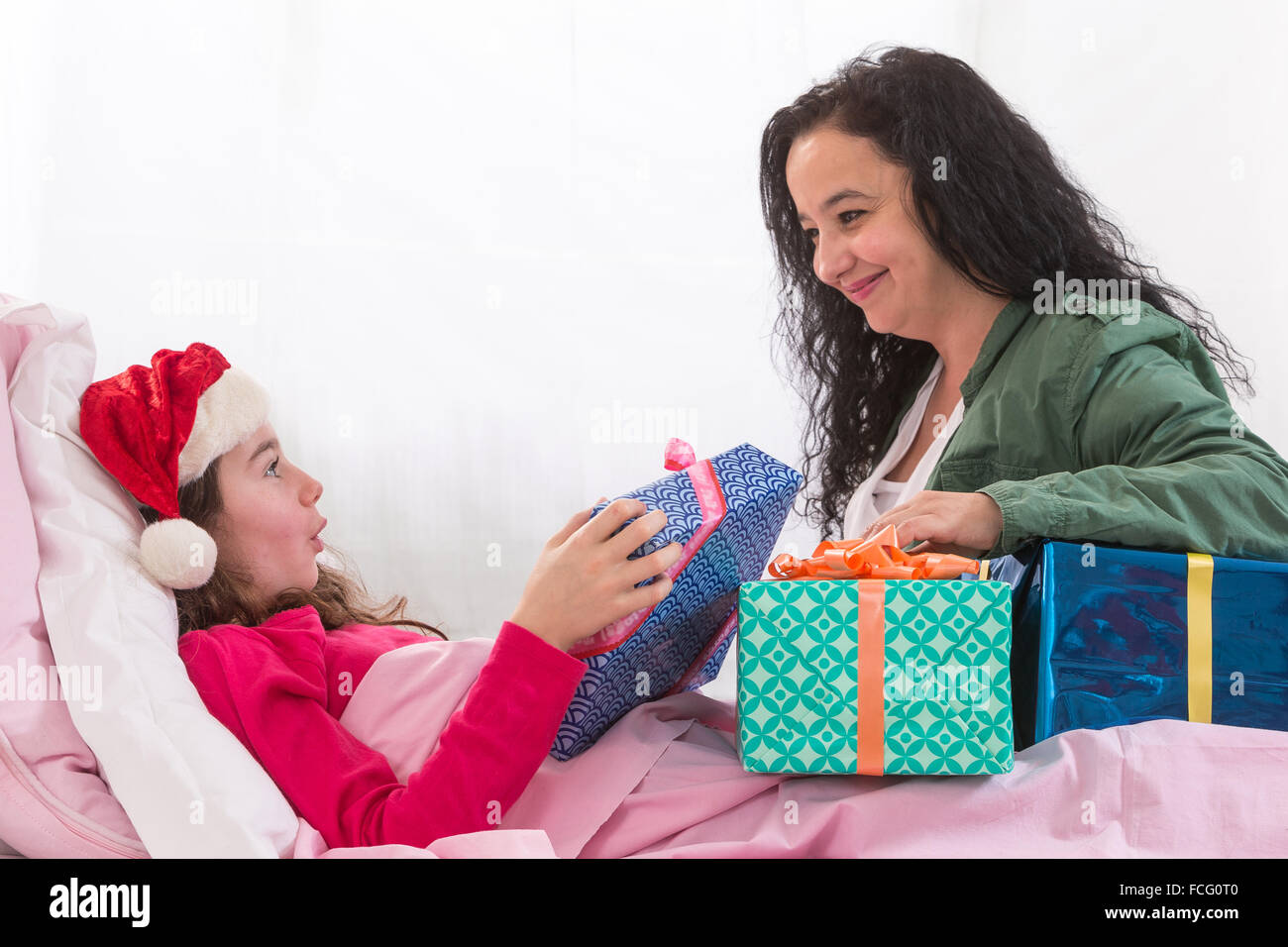 Child receiving gift hi-res stock photography and images - Alamy