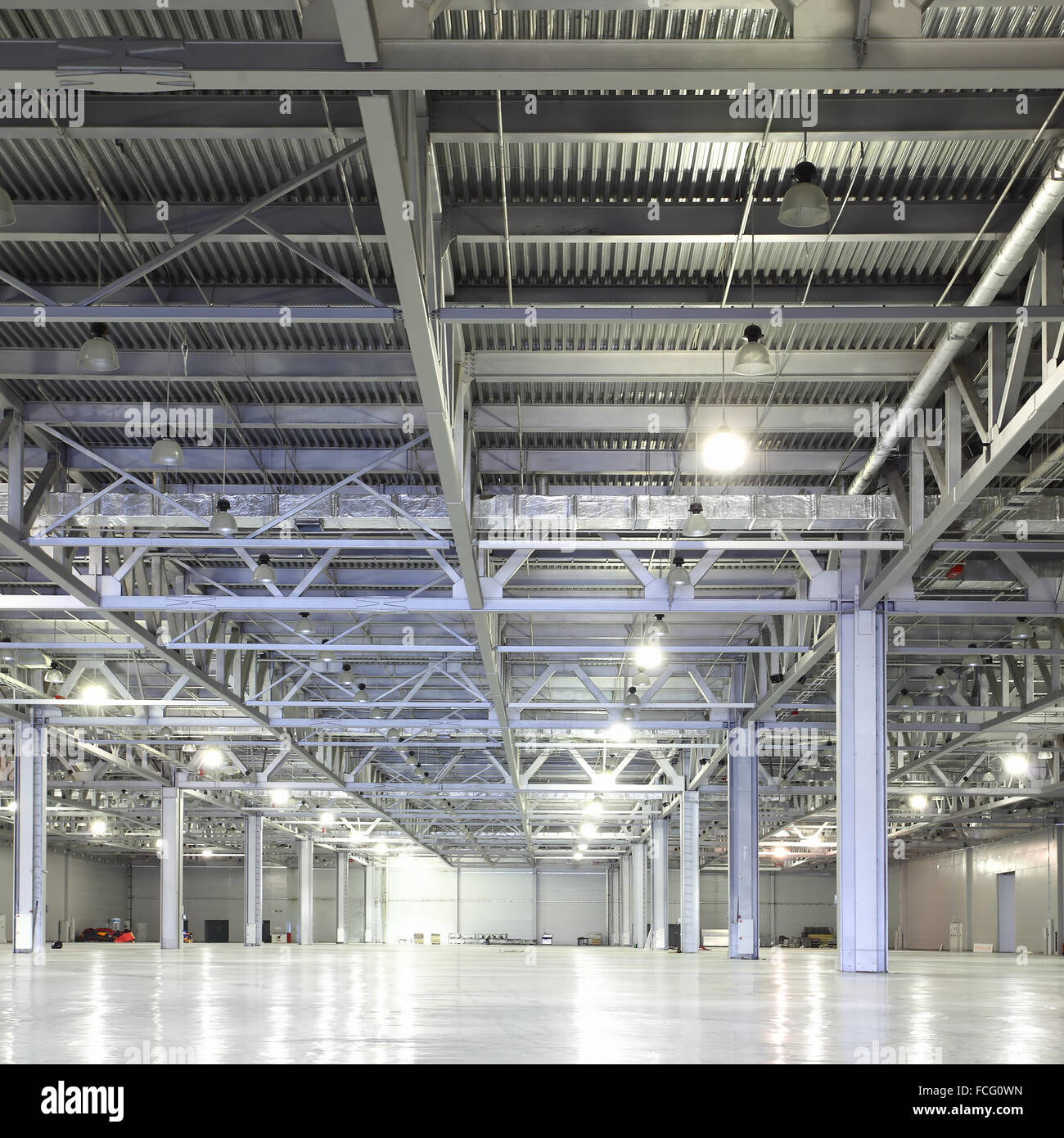 Interior of huge empty storehouse Stock Photo - Alamy