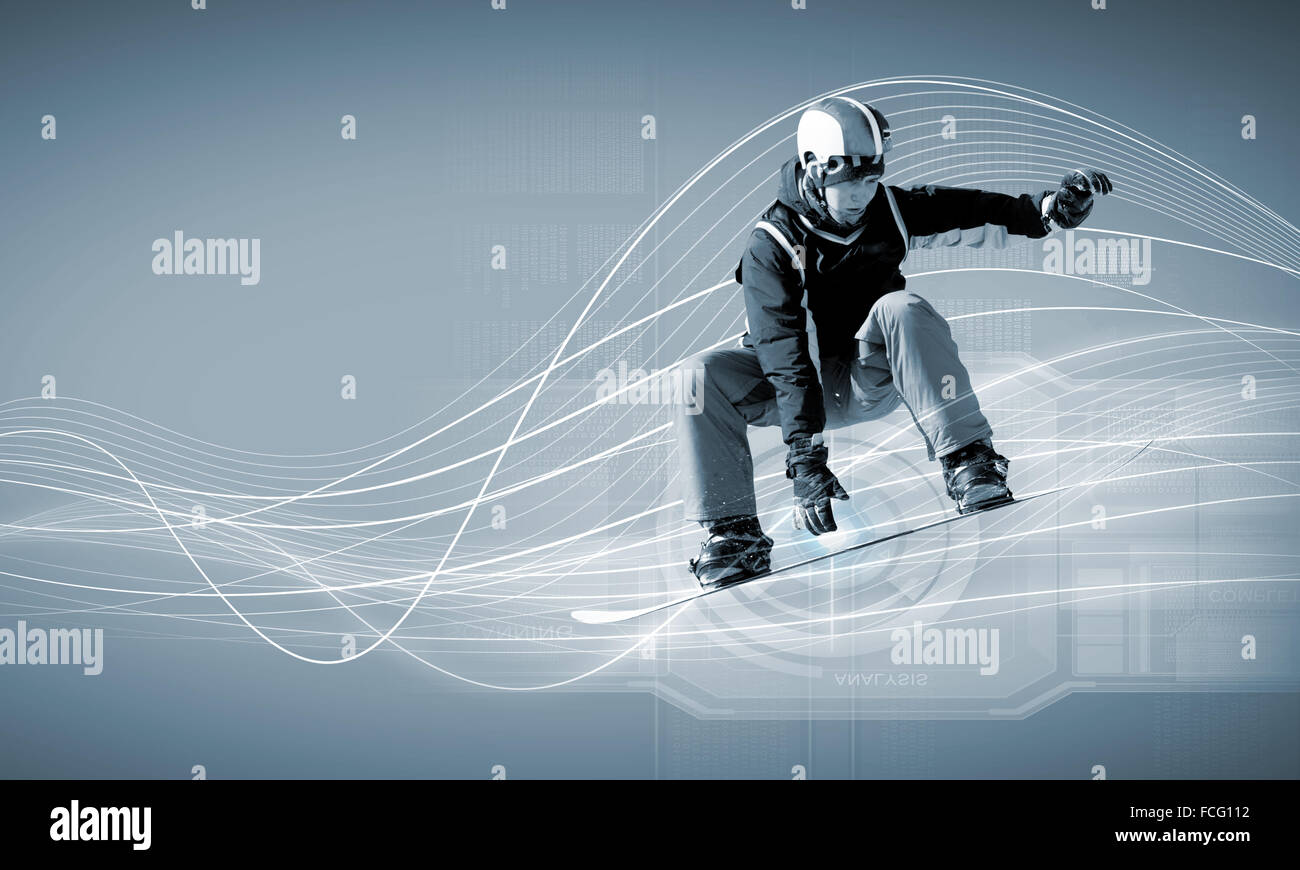 Male snowboarder making jump against media background Stock Photo - Alamy