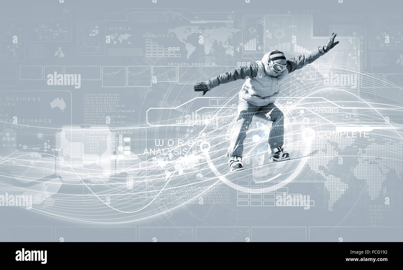 Male snowboarder making jump against media background Stock Photo - Alamy