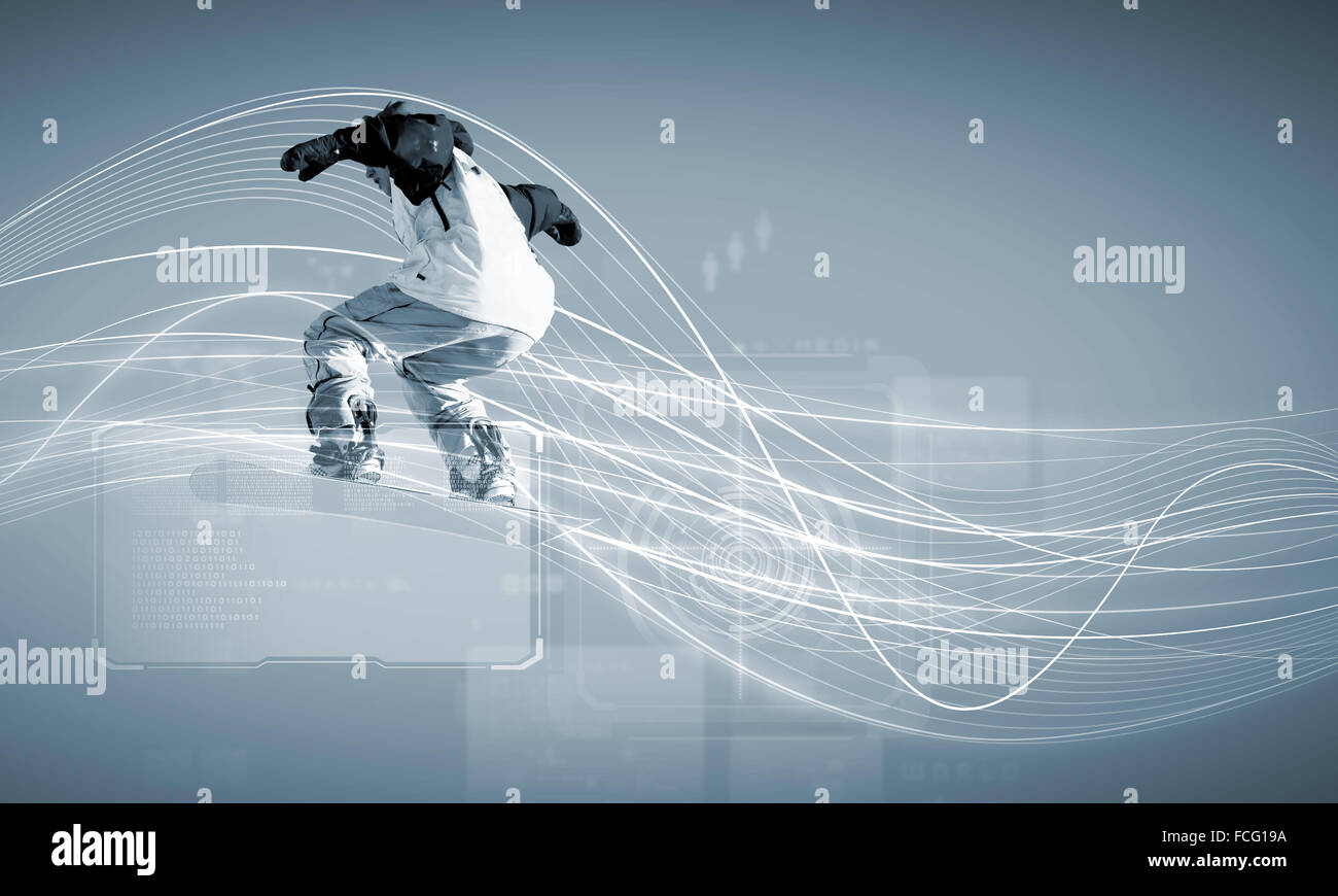 Male snowboarder making jump against media background Stock Photo - Alamy