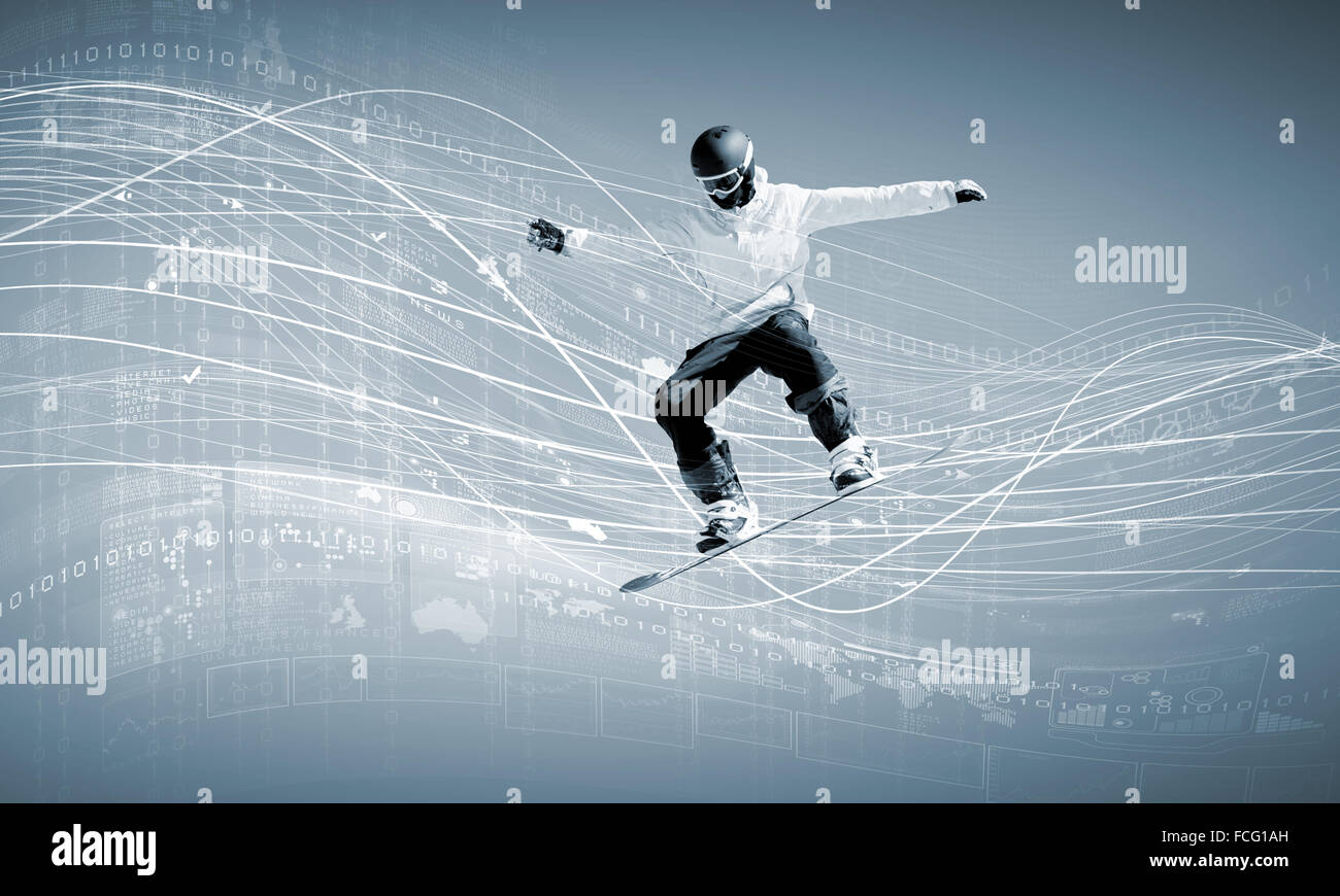 Male snowboarder making jump against media background Stock Photo - Alamy