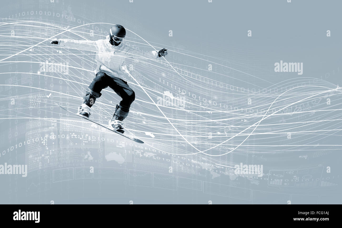 Male snowboarder making jump against media background Stock Photo - Alamy