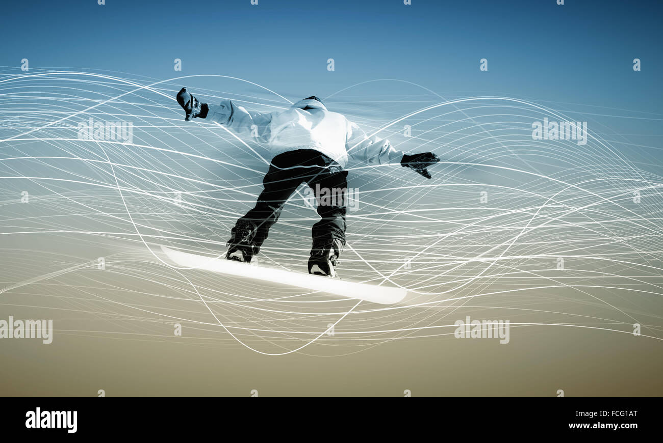Male snowboarder making jump against media background Stock Photo - Alamy