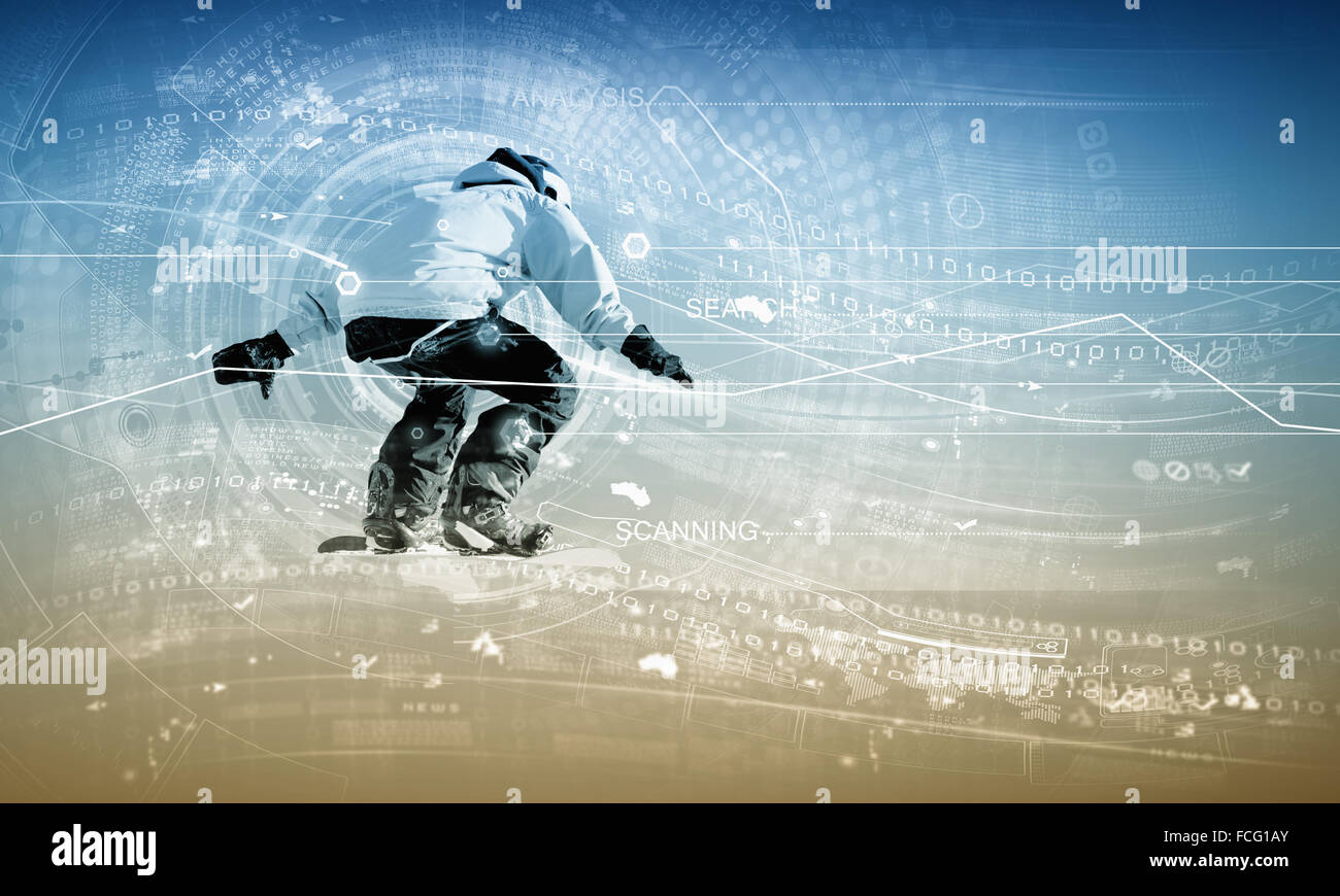 Male snowboarder making jump against media background Stock Photo - Alamy