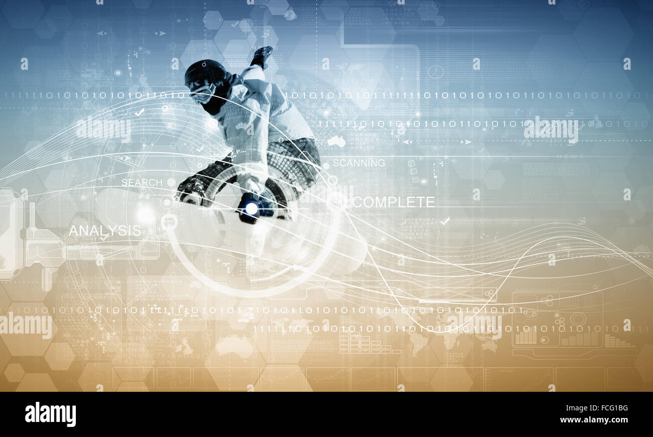 Male snowboarder making jump against media background Stock Photo - Alamy