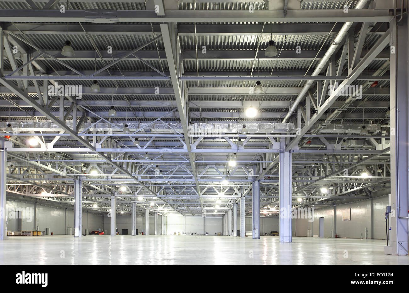 Interior of huge empty storehouse Stock Photo - Alamy