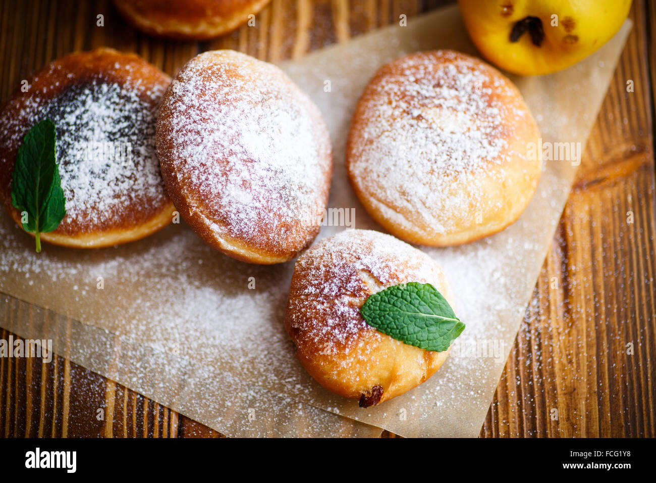 fried donuts with quince inside Stock Photo - Alamy