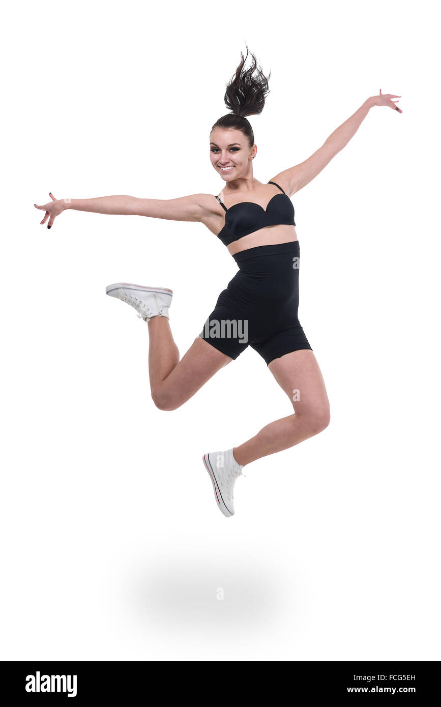 Aerobics fitness woman jumping isolated in full body Stock Photo - Alamy