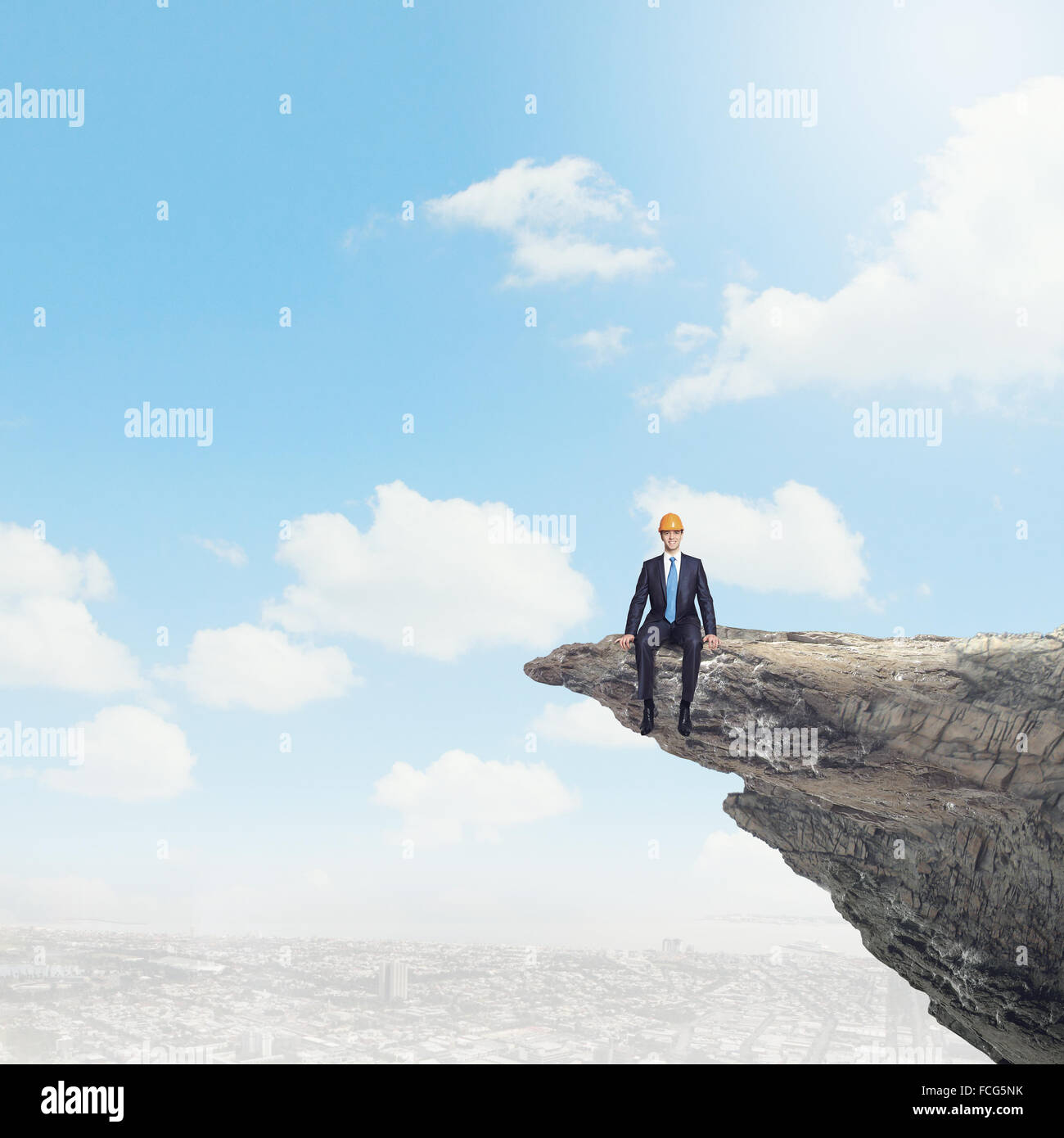 Businessman sitting on hill hi-res stock photography and images - Alamy