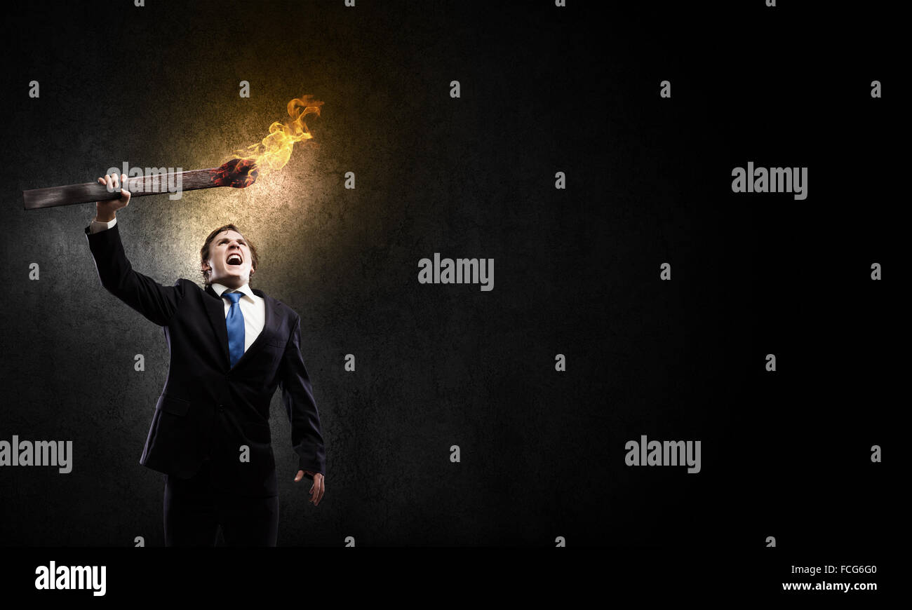 Man carrying fire torch hi-res stock photography and images - Alamy