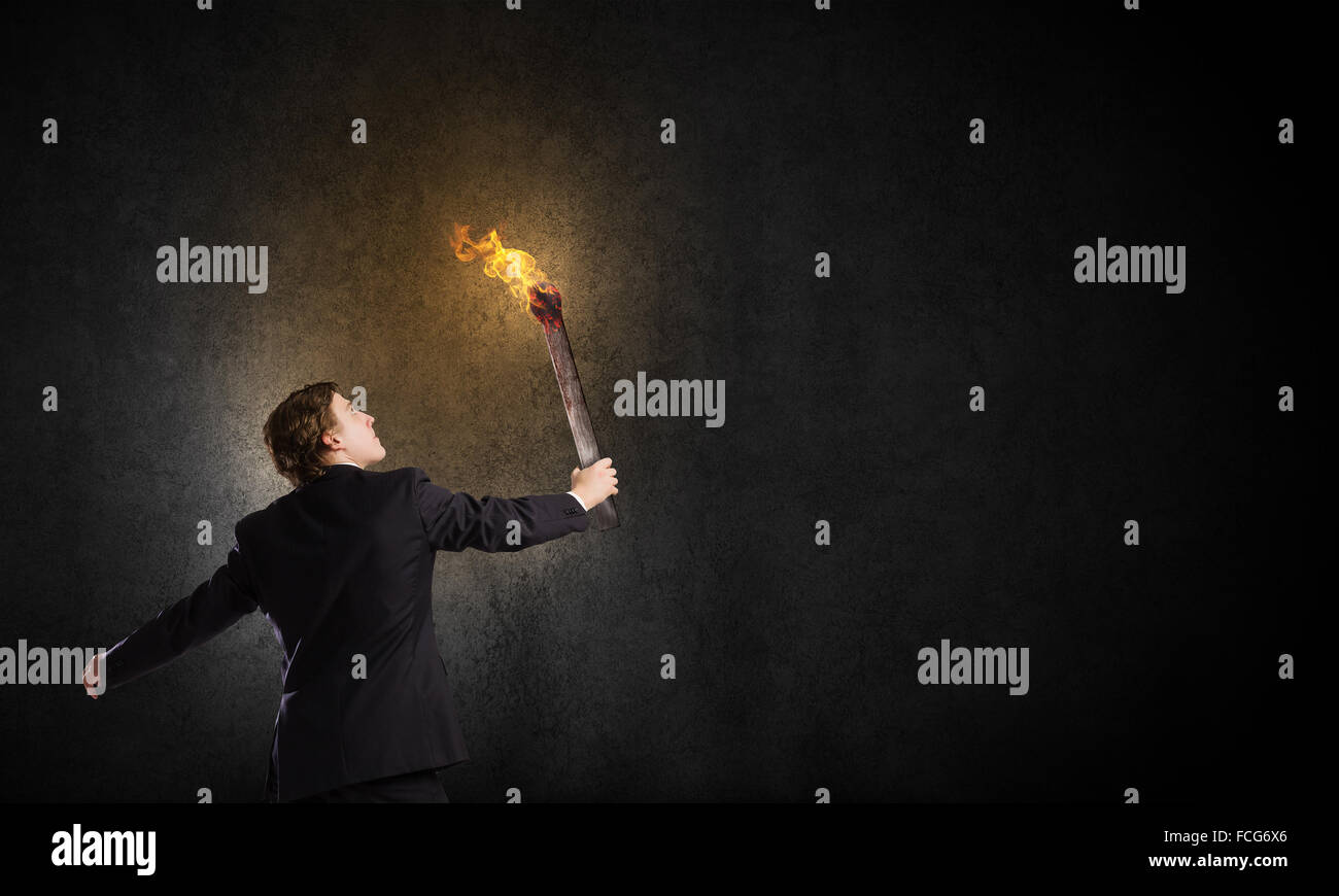 Torch in hand hi-res stock photography and images - Alamy