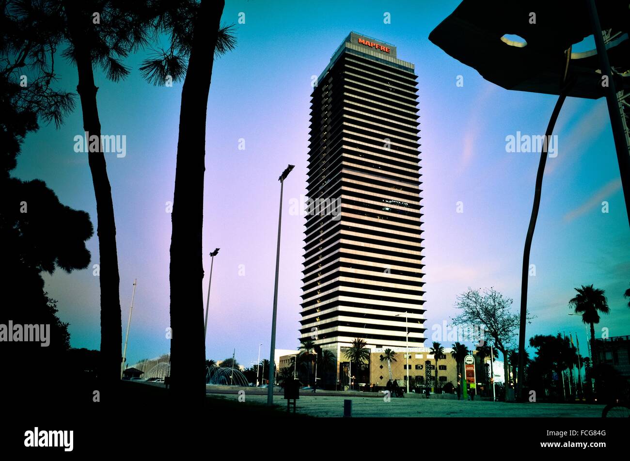 Mapfre tower and David and Goliath sculpture at sunset. Barcelona ...
