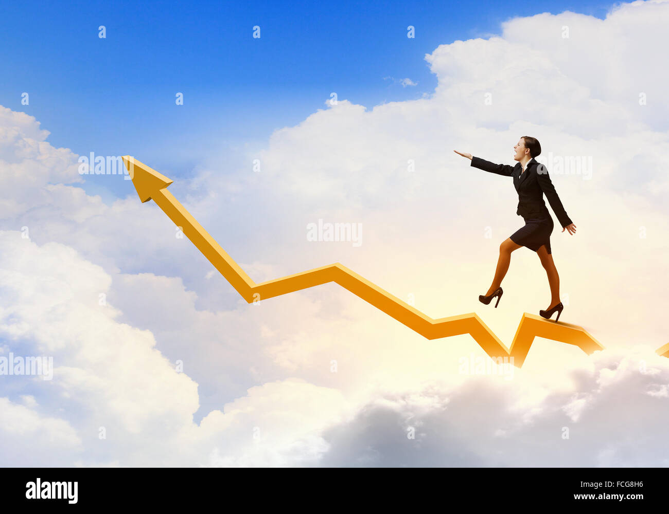 Young businesswoman walking on increasing graph high in sky Stock Photo ...