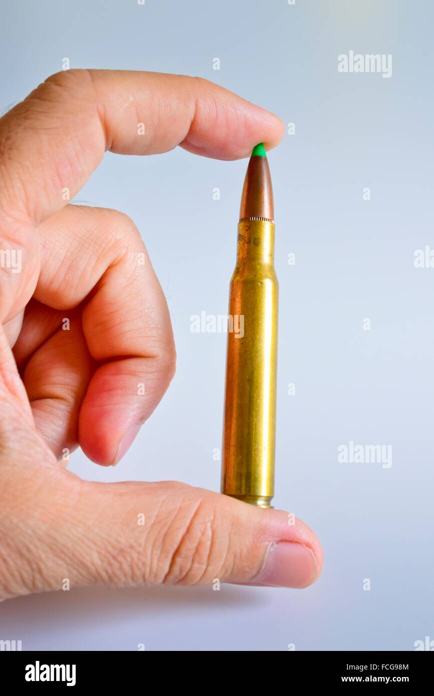Hand holding rifle hi-res stock photography and images - Alamy