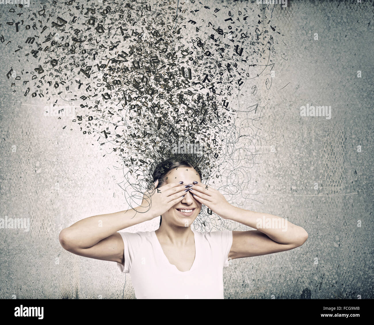 Young woman in casual hiding eyes behind palms Stock Photo - Alamy