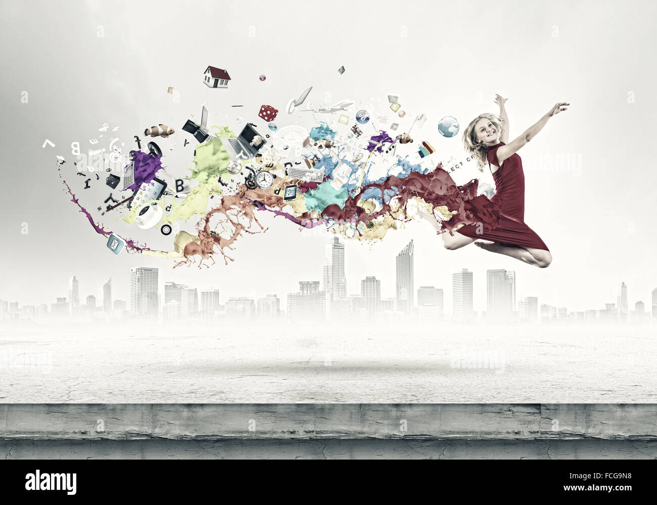 Young woman dancer in red dress jumping high Stock Photo - Alamy