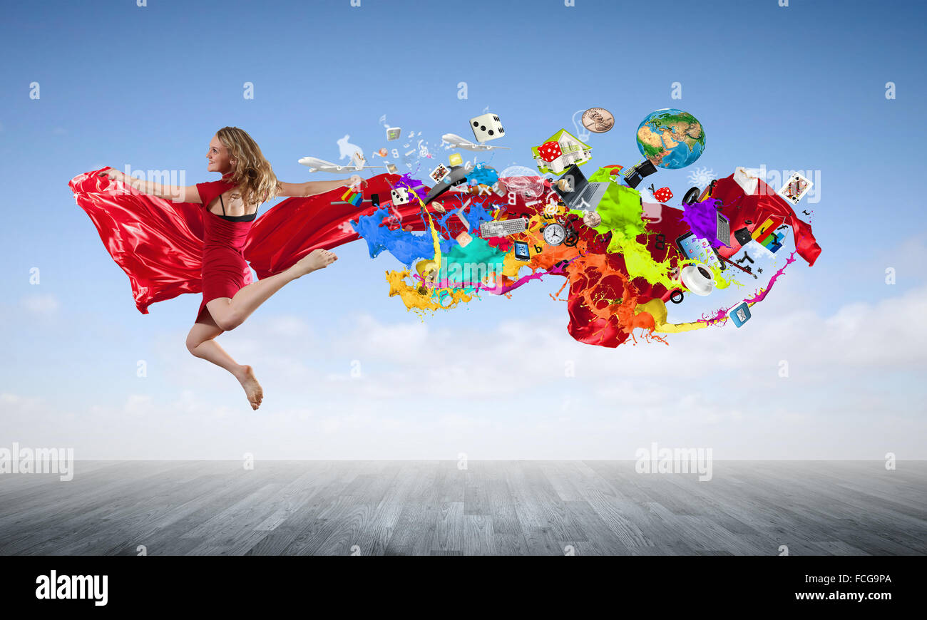 Young woman dancer in red dress jumping high Stock Photo - Alamy