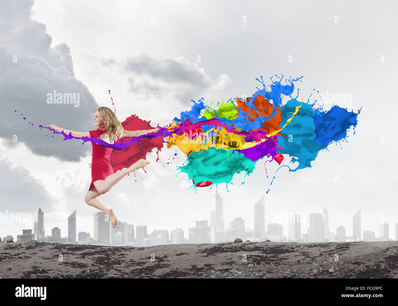 Young woman dancer in red dress jumping high Stock Photo - Alamy
