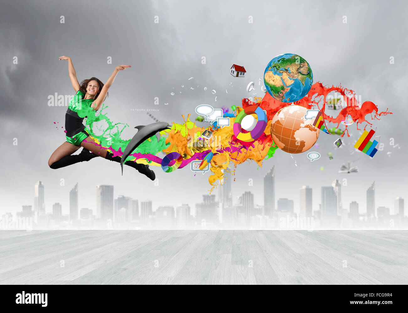 Young woman dancer in green suit jumping high Stock Photo - Alamy