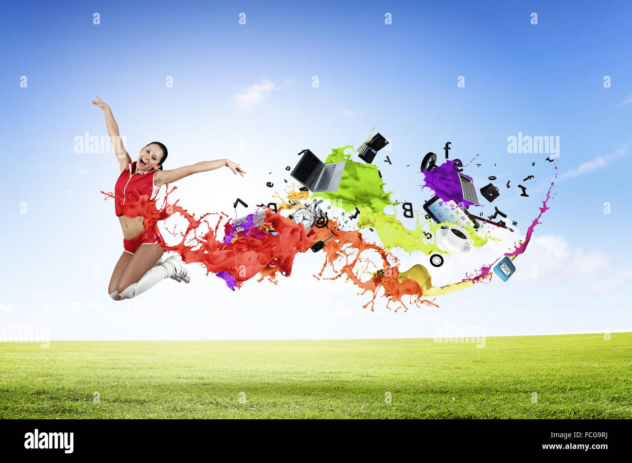 Young woman dancer in red suit jumping high Stock Photo - Alamy
