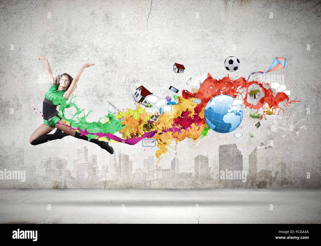 Young woman dancer in green suit jumping high Stock Photo - Alamy