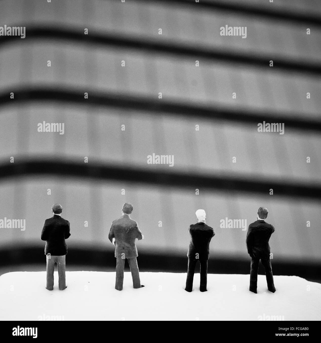 4 people standing rear view Black and White Stock Photos & Images - Alamy