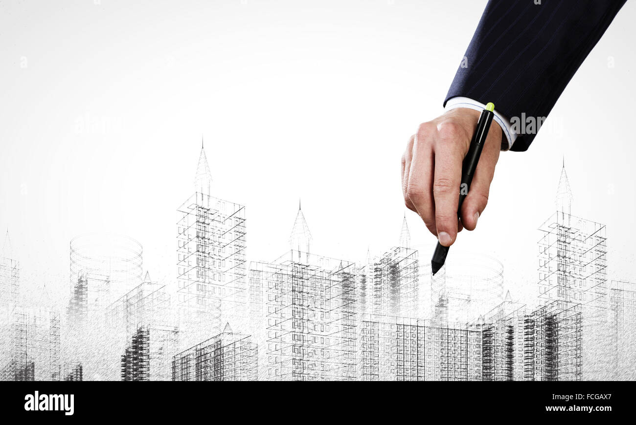 Close up of male hand drawing construction project Stock Photo - Alamy