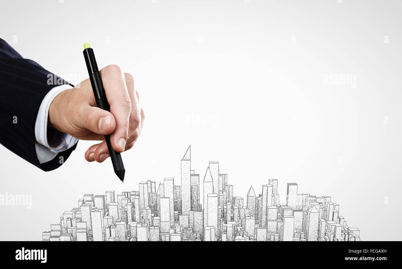 Close up of male hand drawing construction project Stock Photo - Alamy