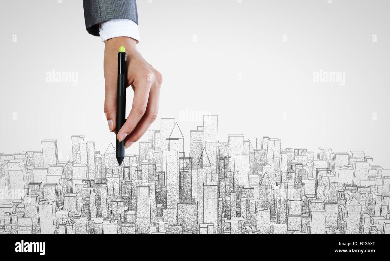 Close up of male hand drawing construction project Stock Photo - Alamy
