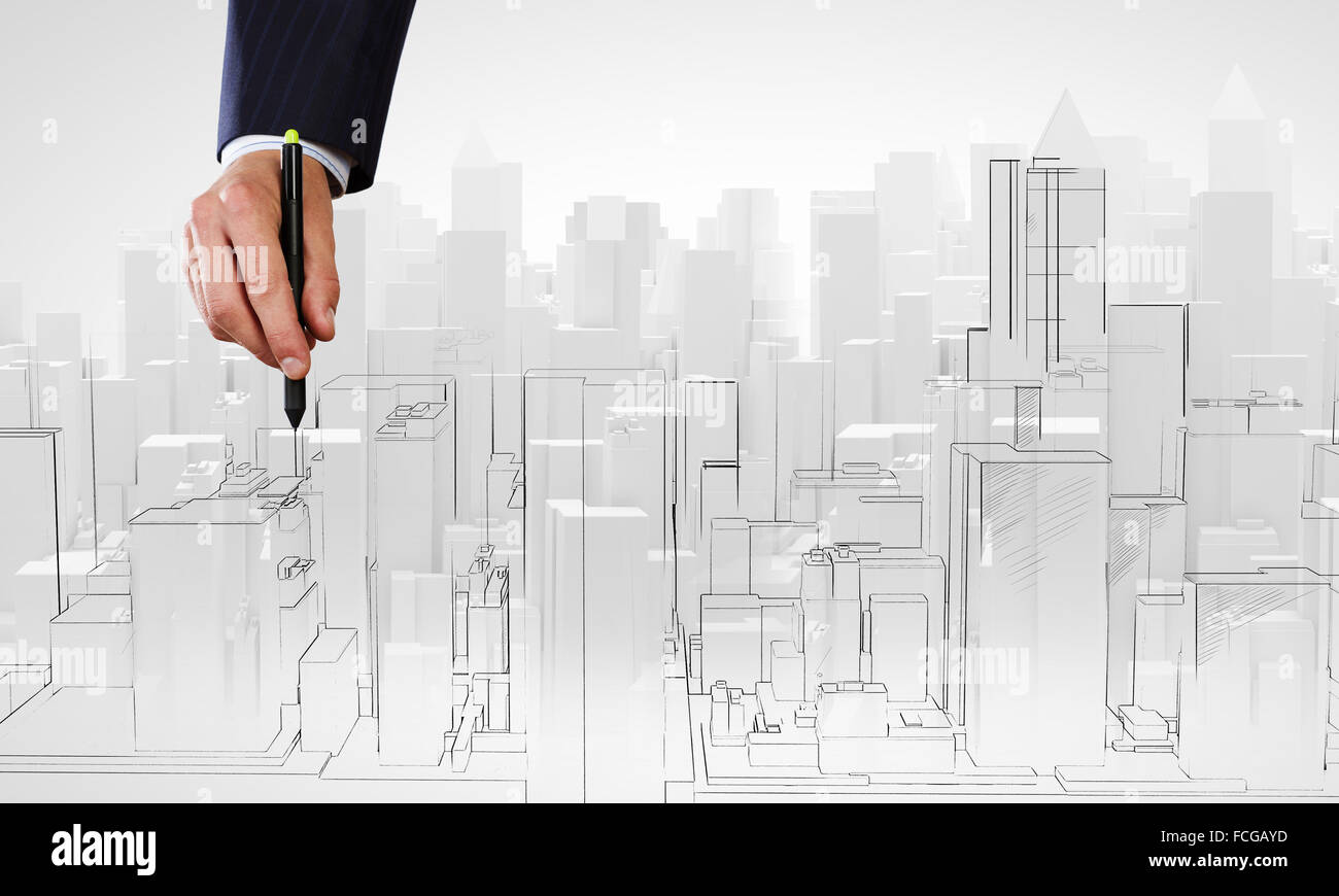 Close up of male hand drawing construction project Stock Photo - Alamy