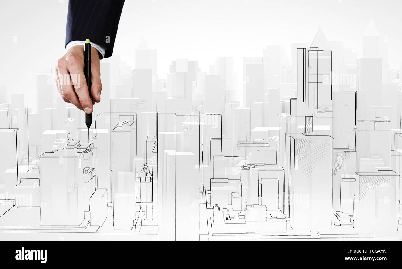 Close up of male hand drawing construction project Stock Photo - Alamy