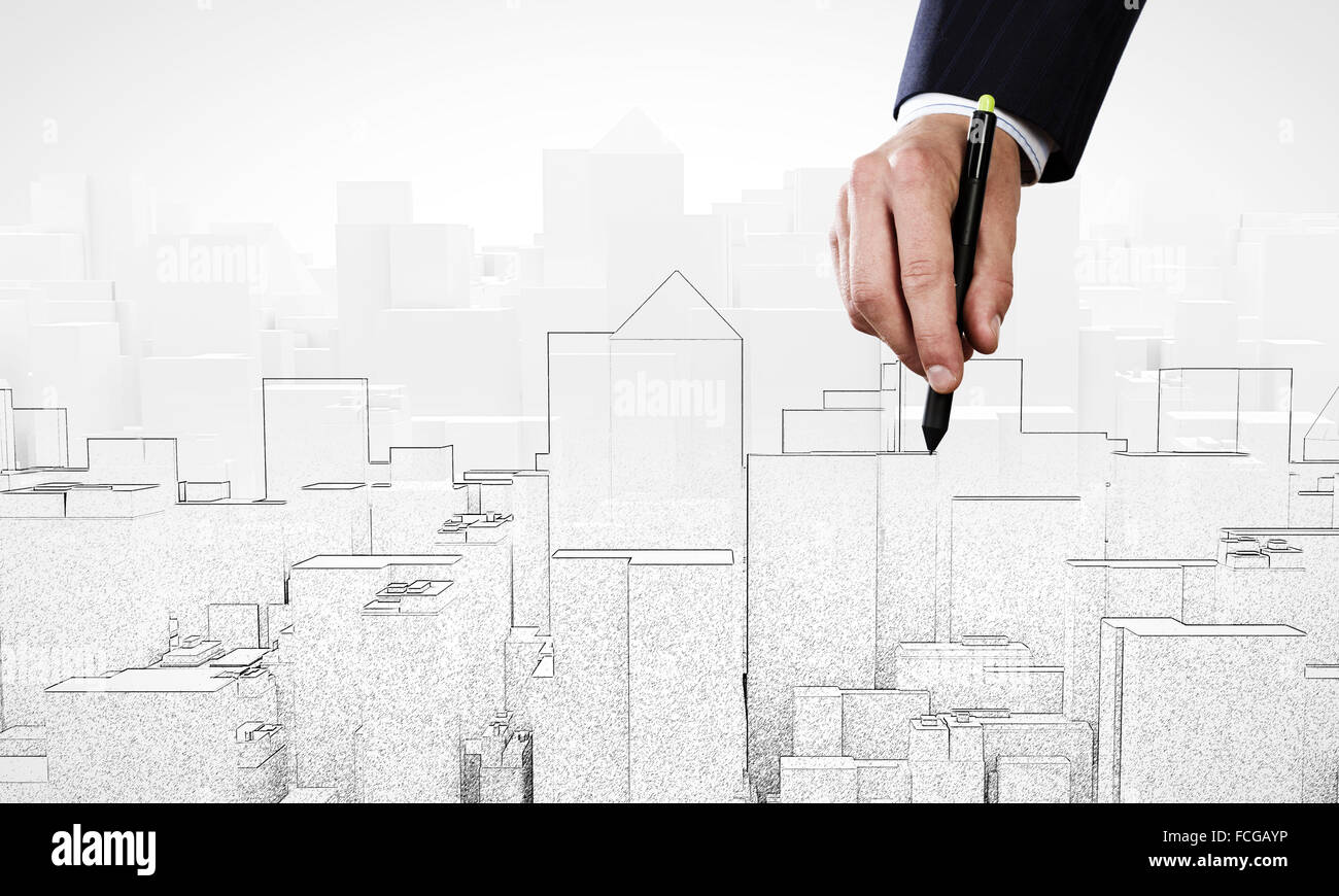 Close up of male hand drawing construction project Stock Photo - Alamy