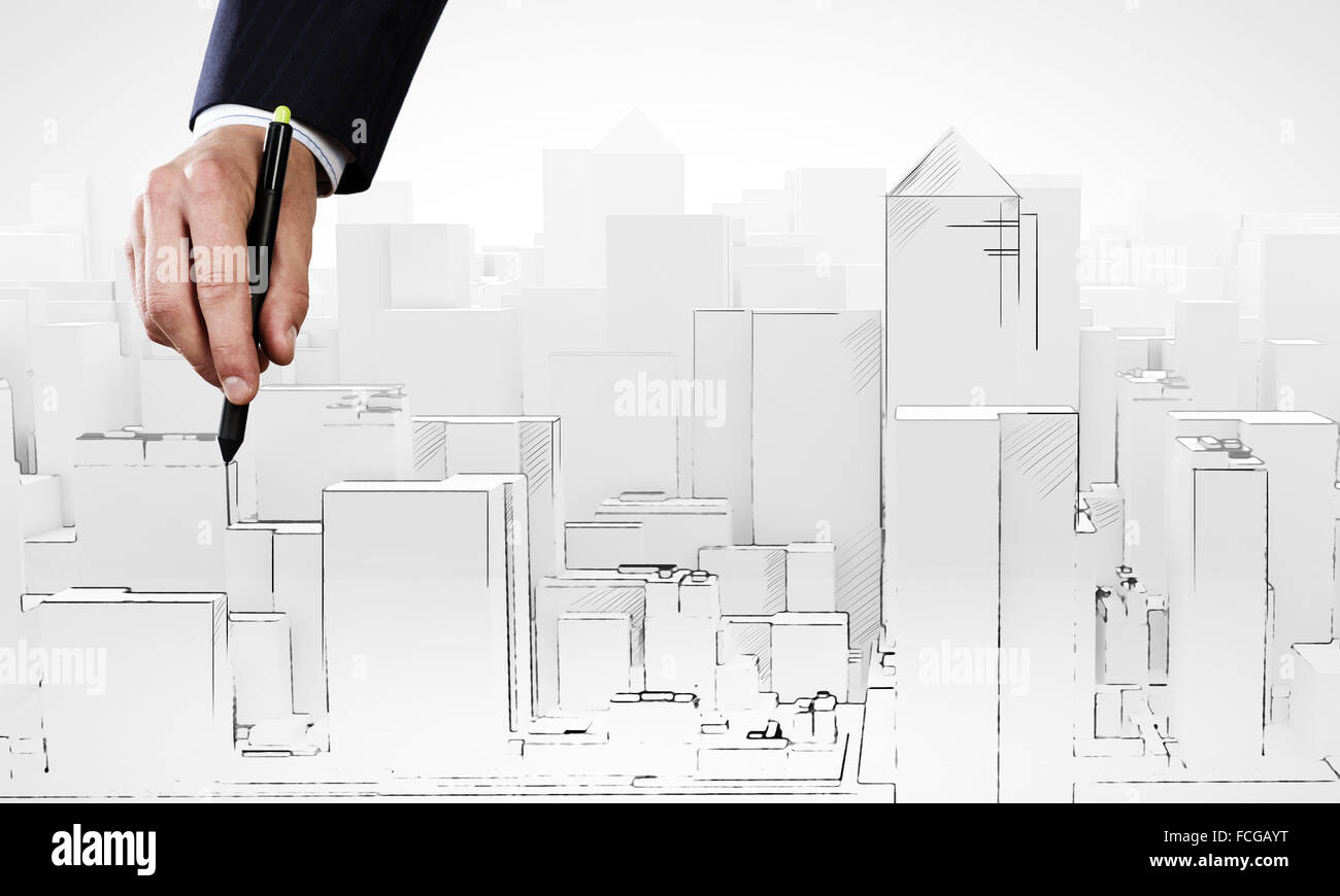 Close up of male hand drawing construction project Stock Photo - Alamy