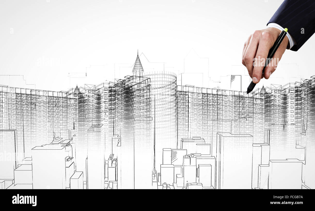 Close up of male hand drawing construction project Stock Photo - Alamy