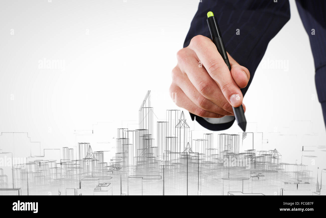 Close up of male hand drawing construction project Stock Photo - Alamy