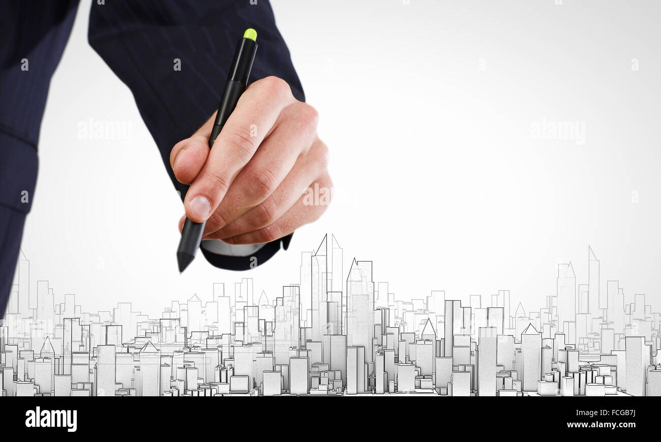 Close up of male hand drawing construction project Stock Photo - Alamy