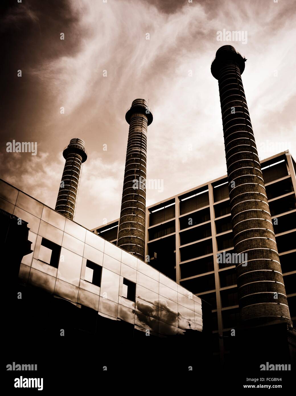 Three chimneys. Old textile industrial complex, nowadays Fecsa Building ...