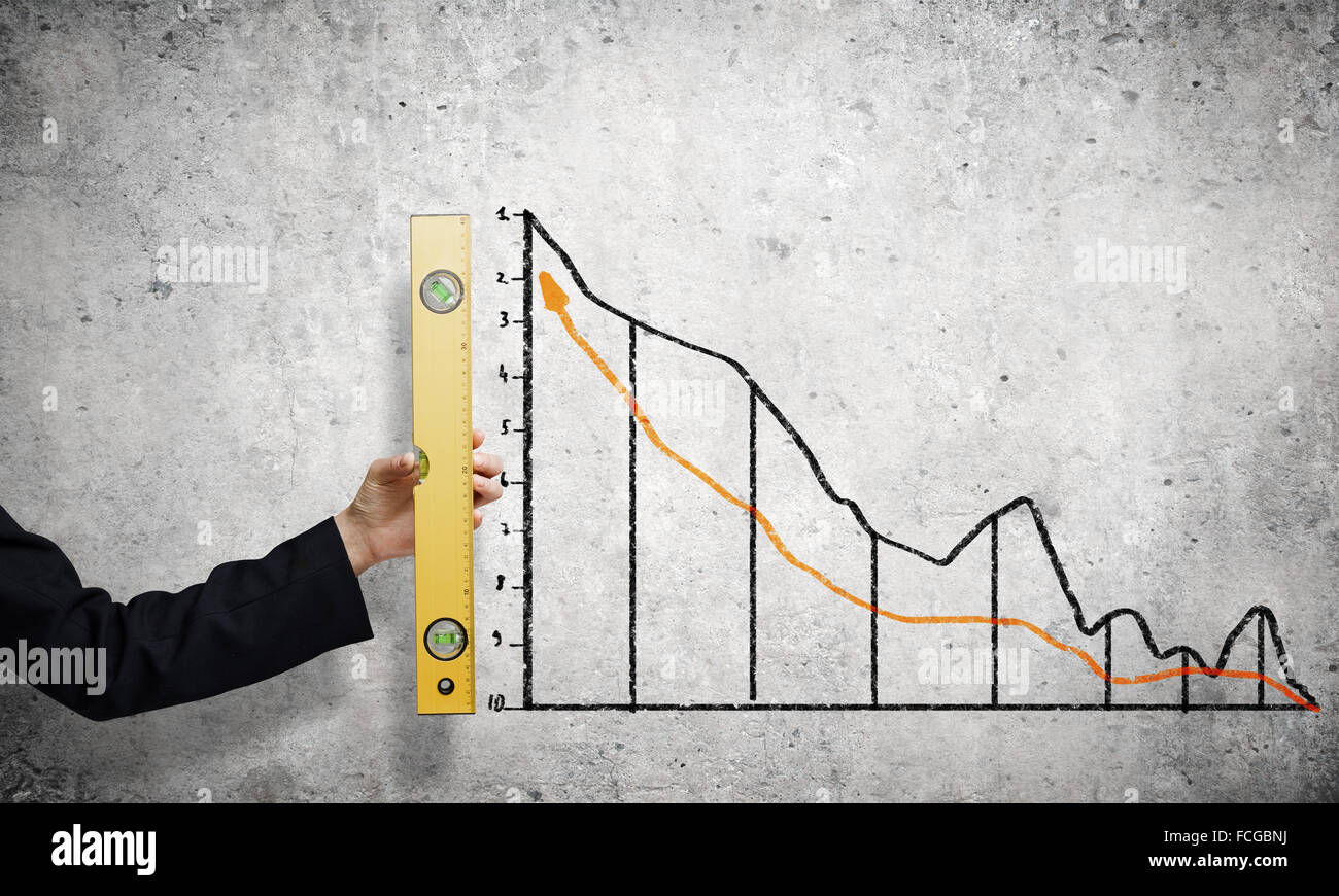 Close up of female hand measuring graph with ruler Stock Photo - Alamy
