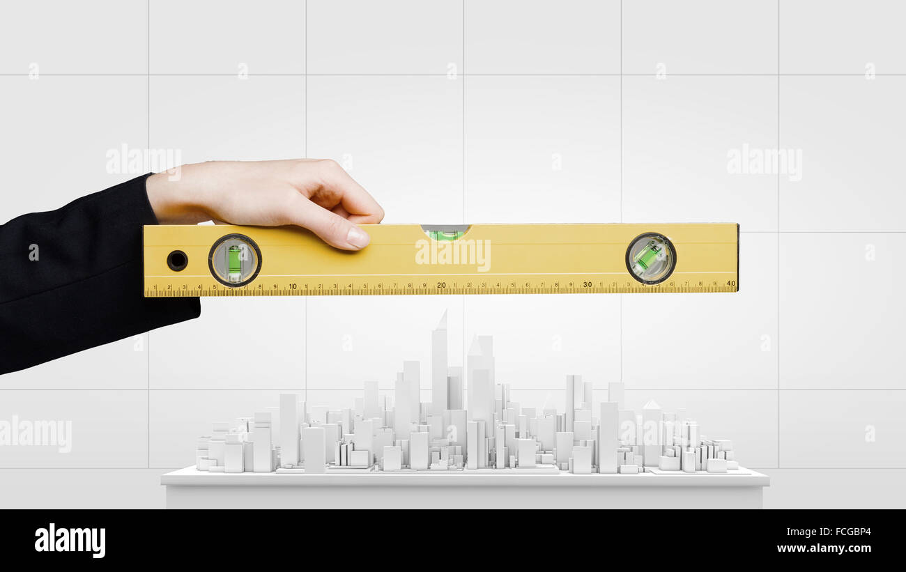 Close up of female hand measuring construction project with ruler Stock ...