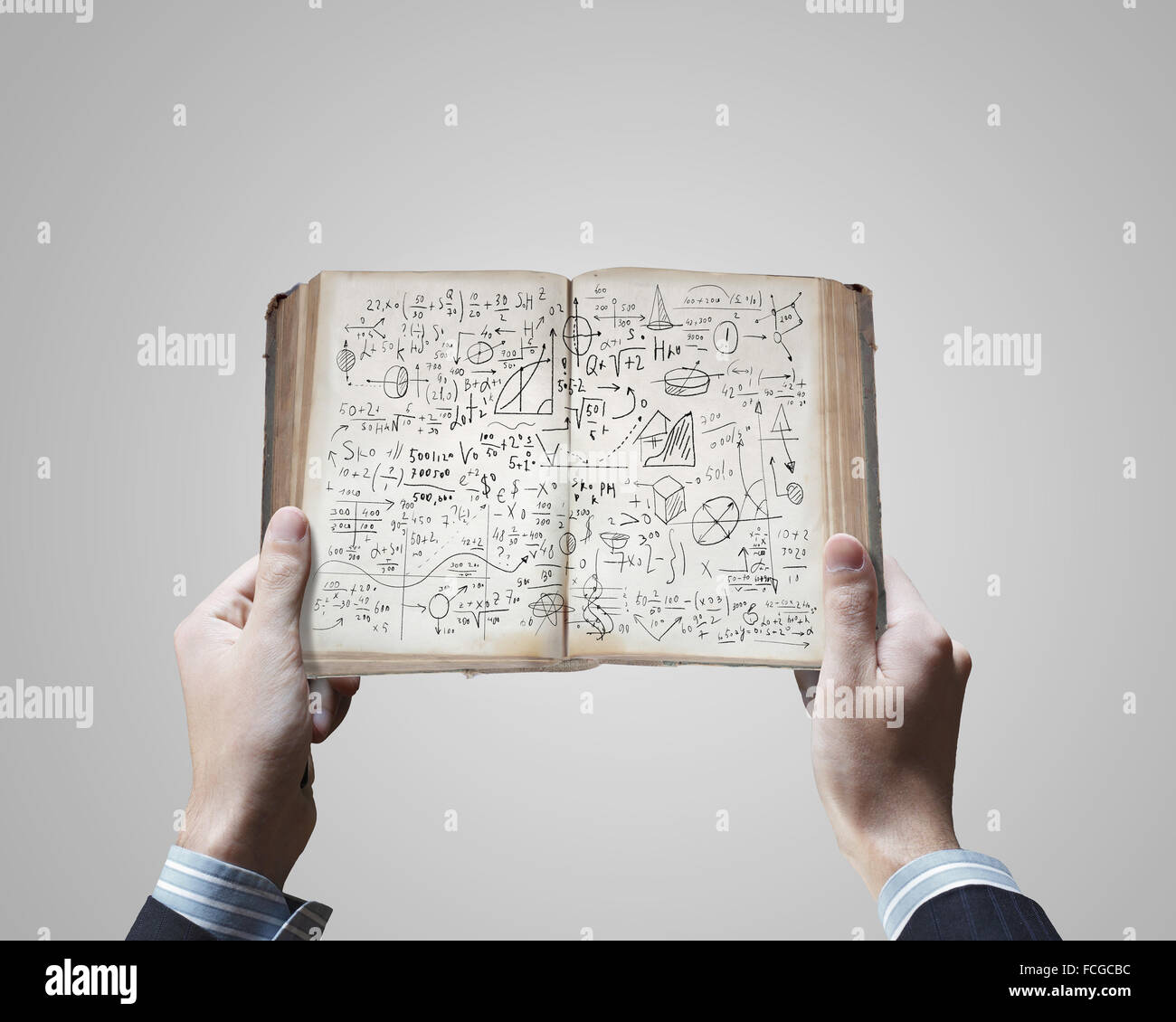 Close up of businessman hands holding opened notepad with sketches ...