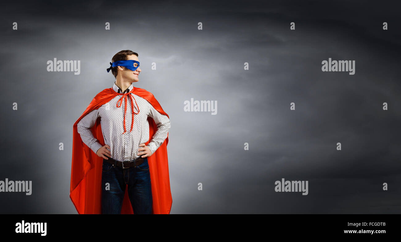 Young confident superman in mask and cape Stock Photo - Alamy