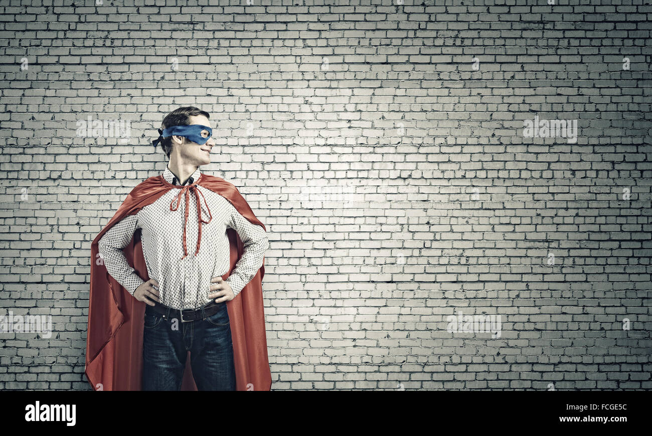 Young confident superman in mask and cape Stock Photo - Alamy