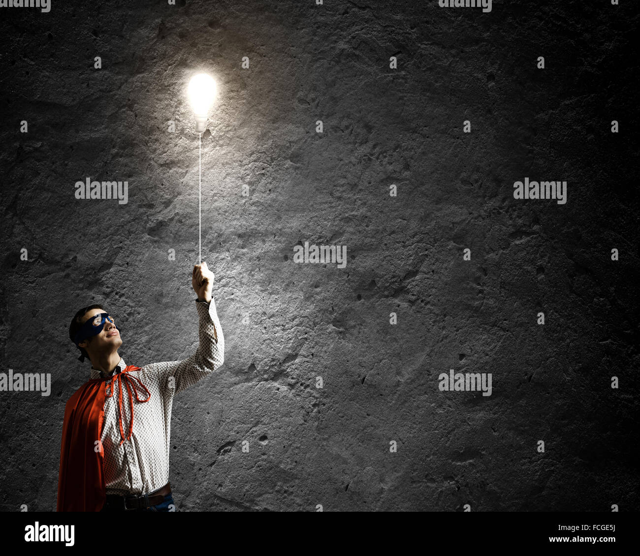 Young confident superman in mask and cape Stock Photo - Alamy
