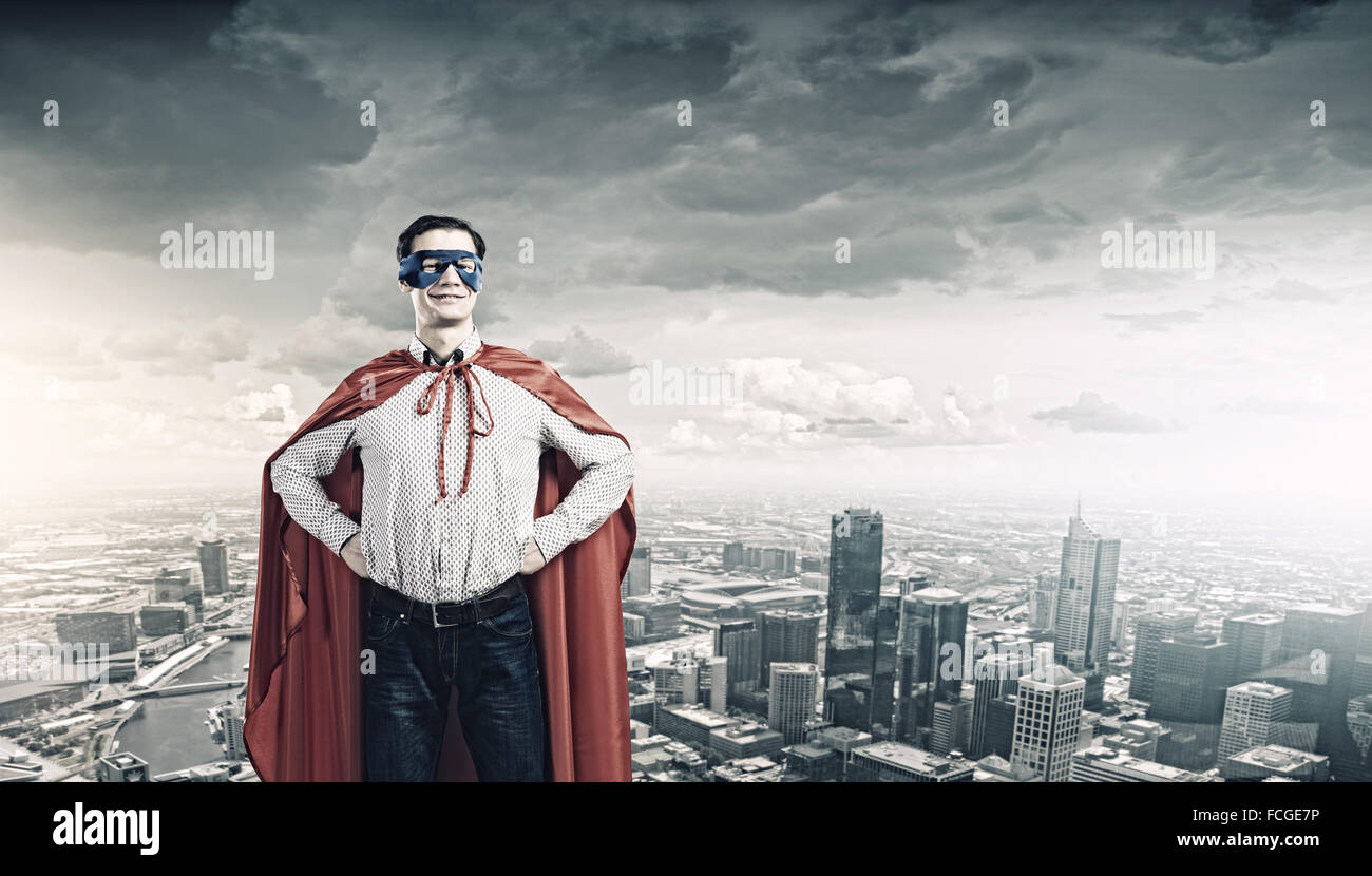 Young confident superman in mask and cape Stock Photo - Alamy